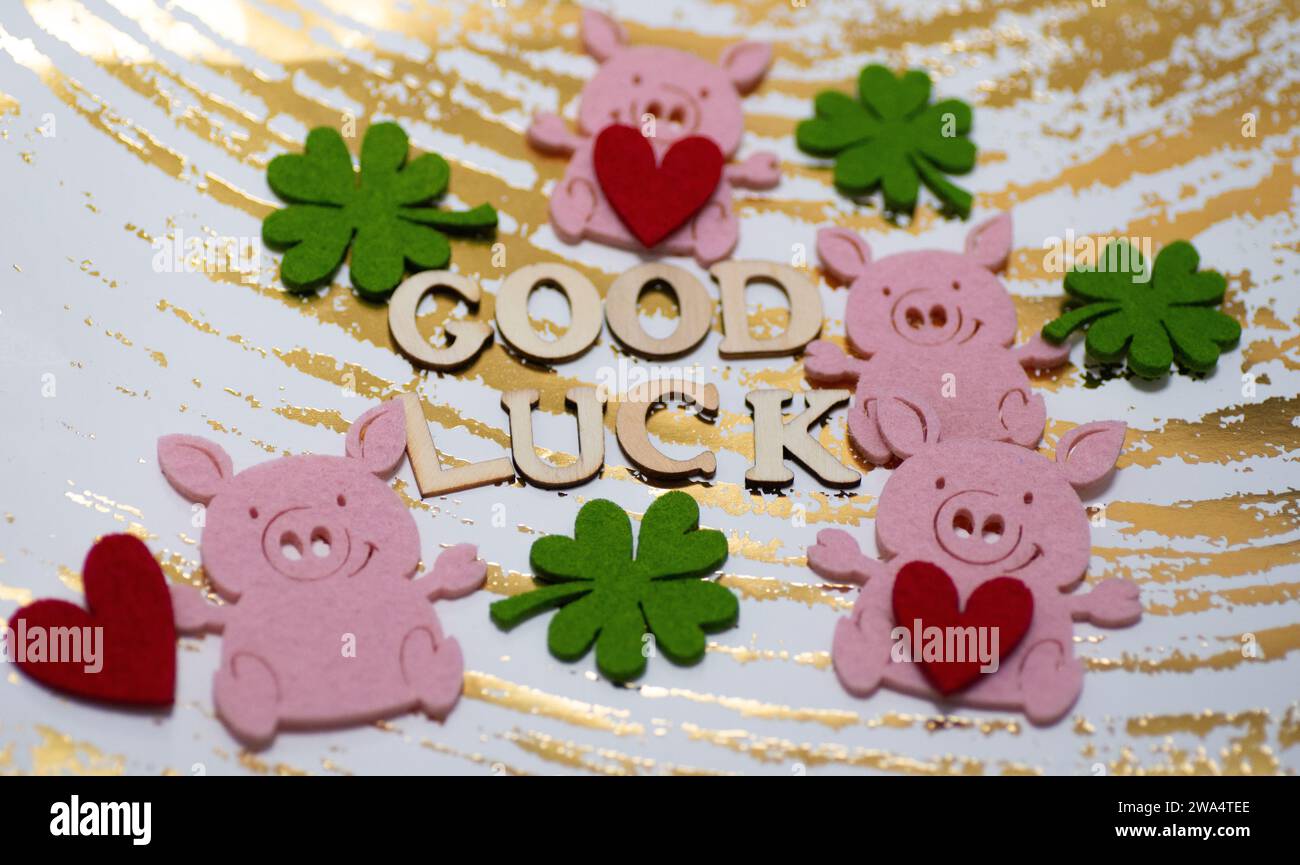 Pink lucky pigs with hearts and or lucky clovers wish you all the best ...