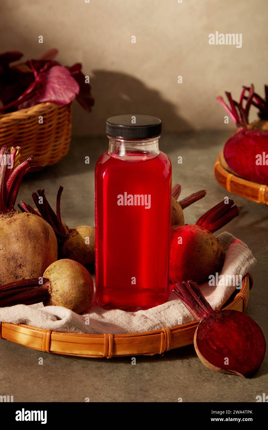 Advertising image for a fruit juice bottle with an unlabeled glass ...