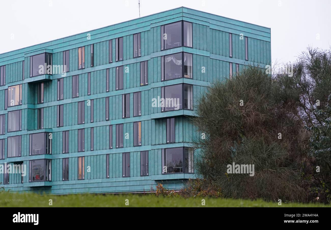 Blue rectangular architecture vividly complimenting with nature Stock ...