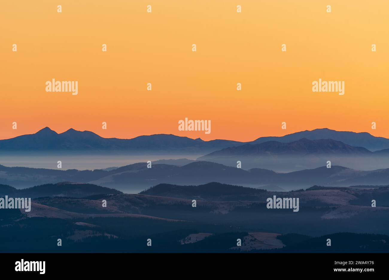 Beautiful, colorful mountain landscape in orange and blue tones with ...