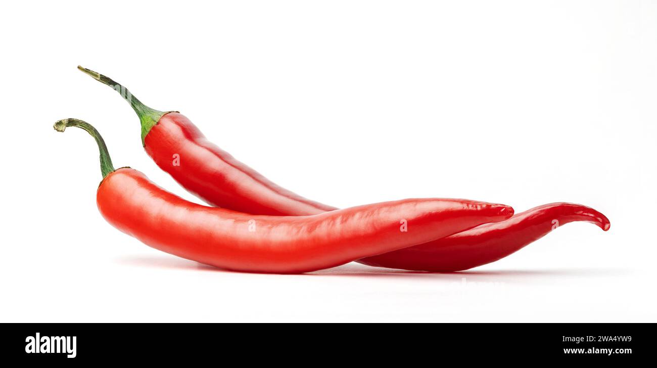 Two red hot chilli peppers isolated on white background Stock Photo - Alamy