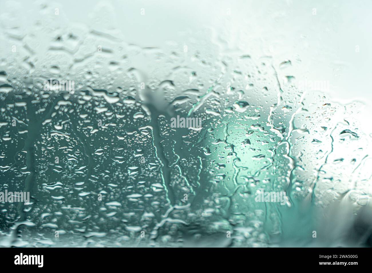 drops of rainwater running down the glass Stock Photo - Alamy