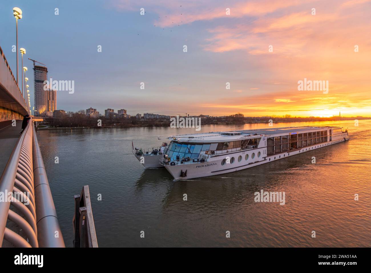 Vienna: river Donau (Danube) at sunrise, cruise ship, bridge ...
