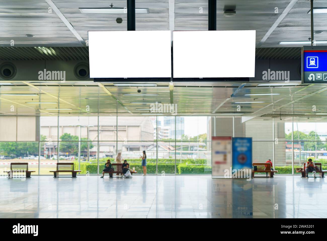 White billboard in a bustling train station terminal blank canvas ...