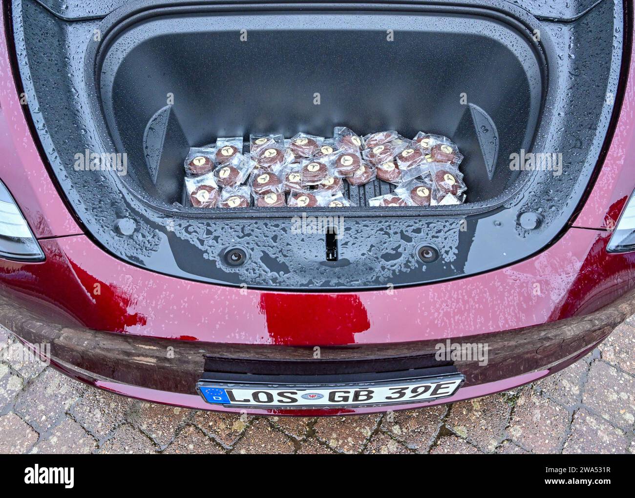 02 January 2024, Brandenburg, Grünheide: Chocolate lies in a Tesla ...