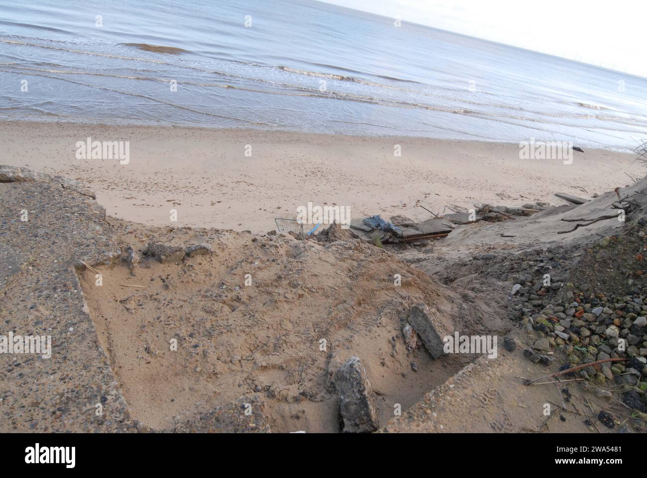 Broken edge of Access Road that collapsed due to coastal erosion, on ...