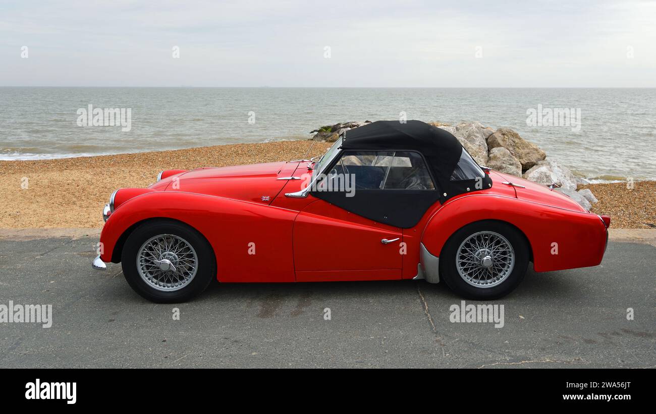 Classic Red MGA Open Top Sports car parked on seafront promenade Stock ...