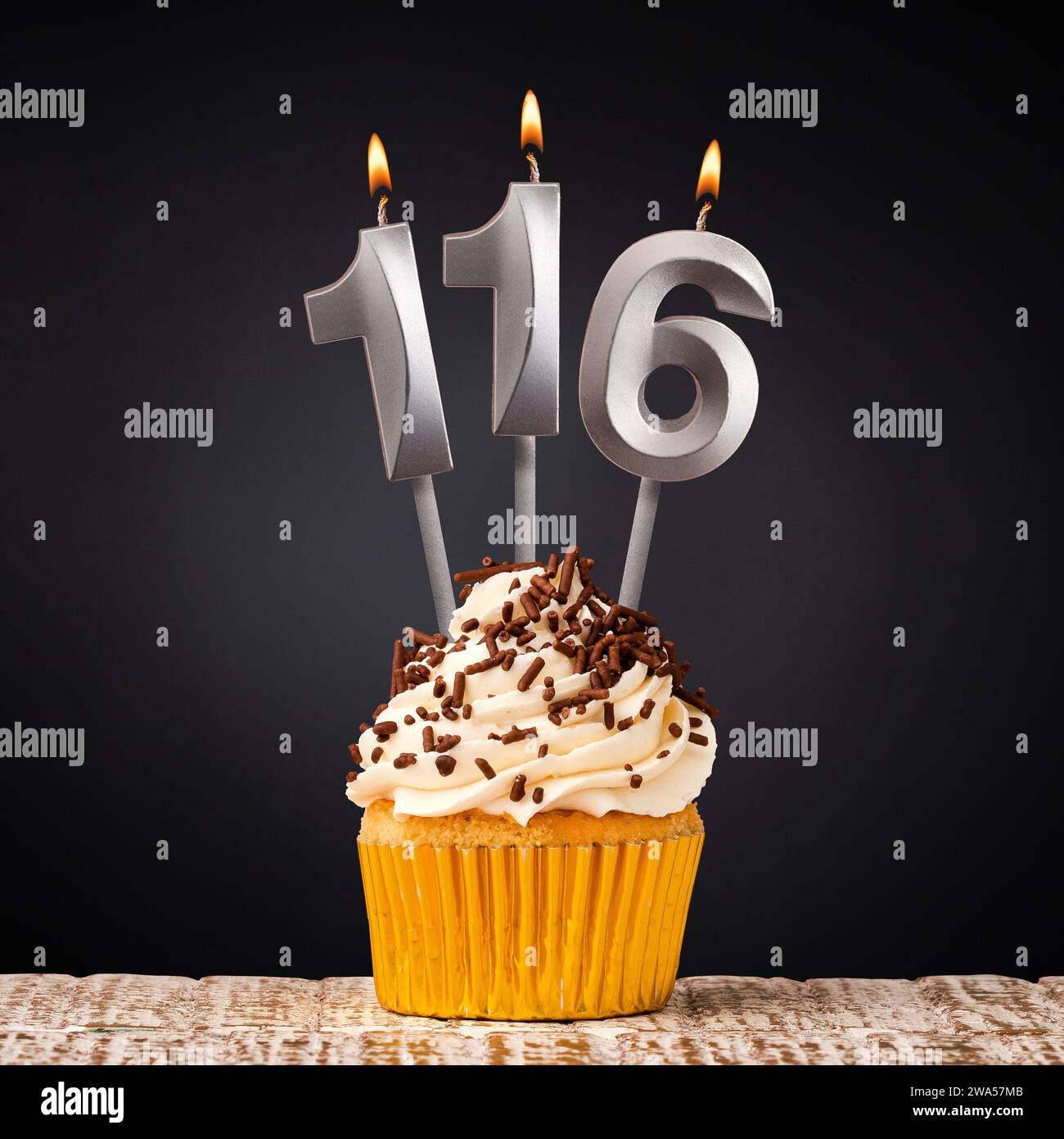 birthday cupcake with number 116 candle - Celebration on dark ...