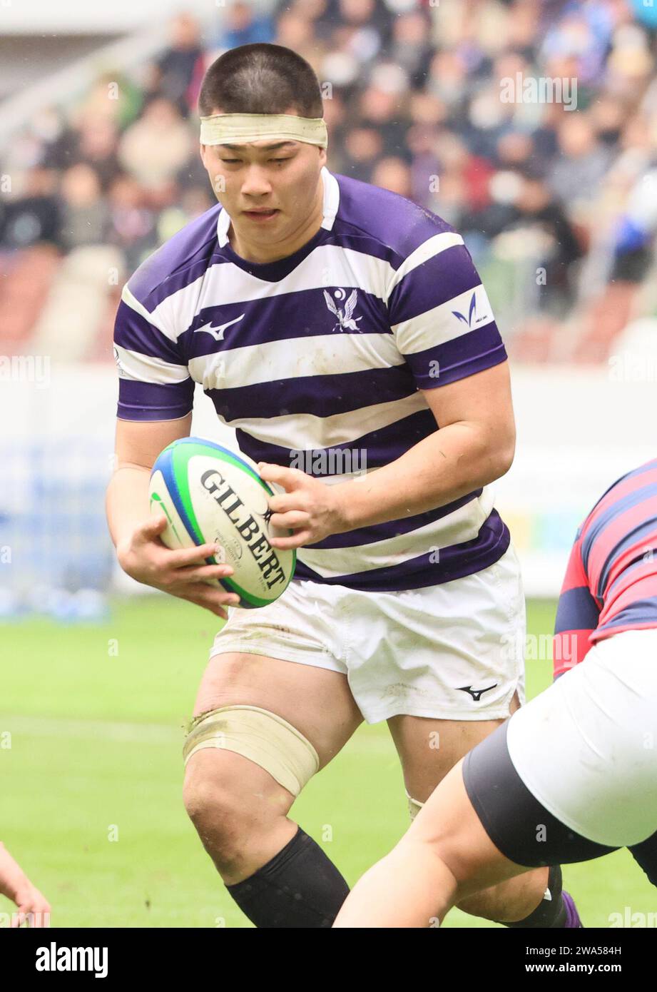 Tokyo, Japan. 2nd Jan, 2024. Meiji University lock Daichi Sato carries the ball during the semi ...