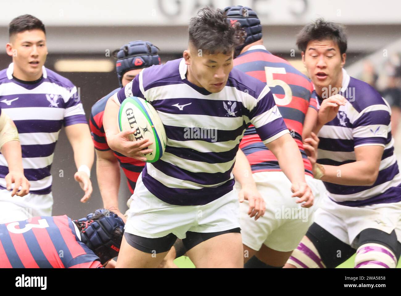 Tokyo, Japan. 2nd Jan, 2024. Meiji University prop Keijiro Tamefusa ...