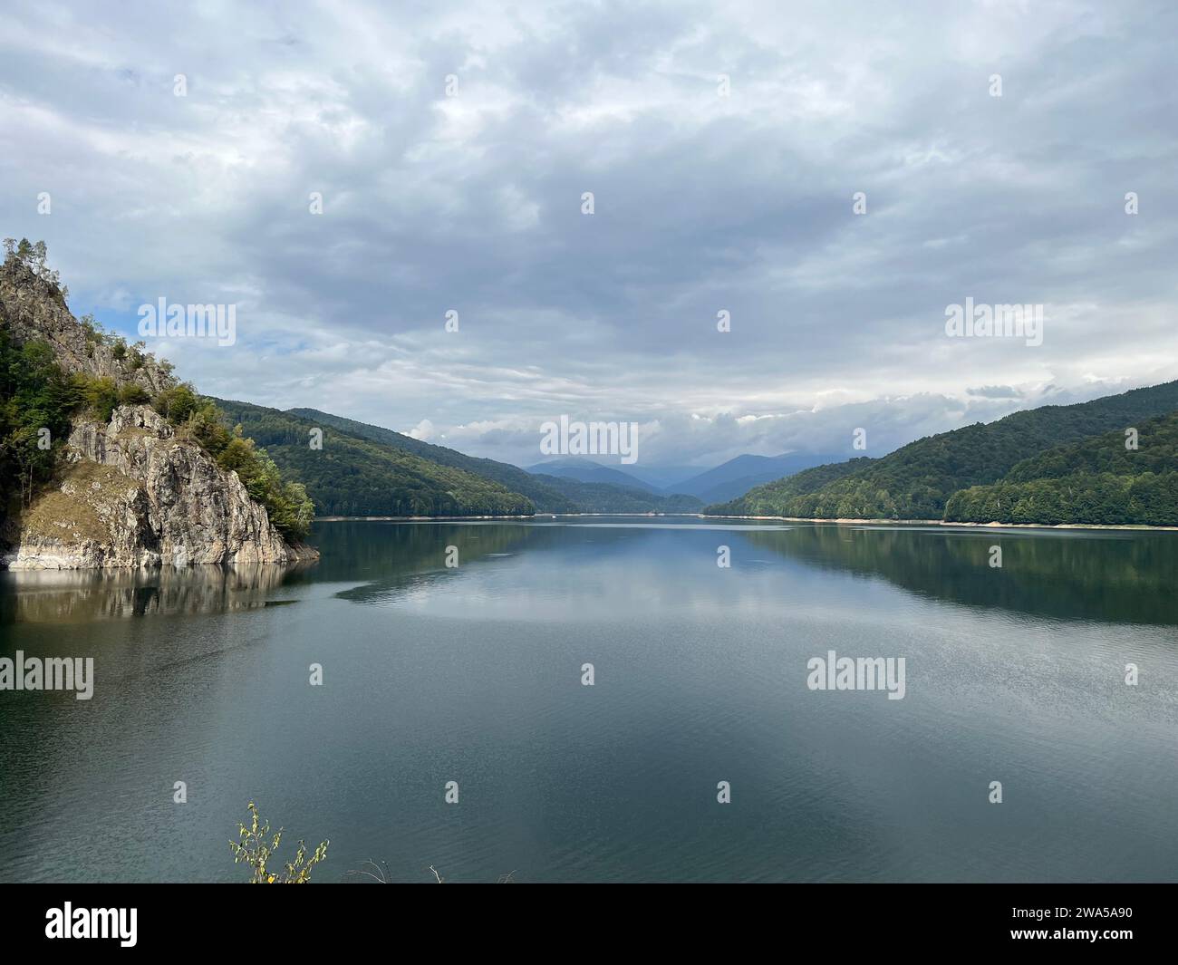 Lake Vidraru near dam, Transfagarasan road, Romania. Scenic view green ...