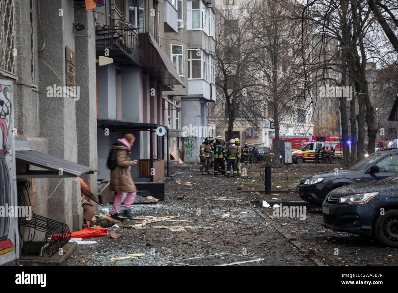 people standing in front of their homes that were targeted by a rocket ...