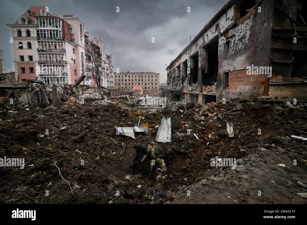 a crater caused by a rocket attack on the city, Several S-300 and ...