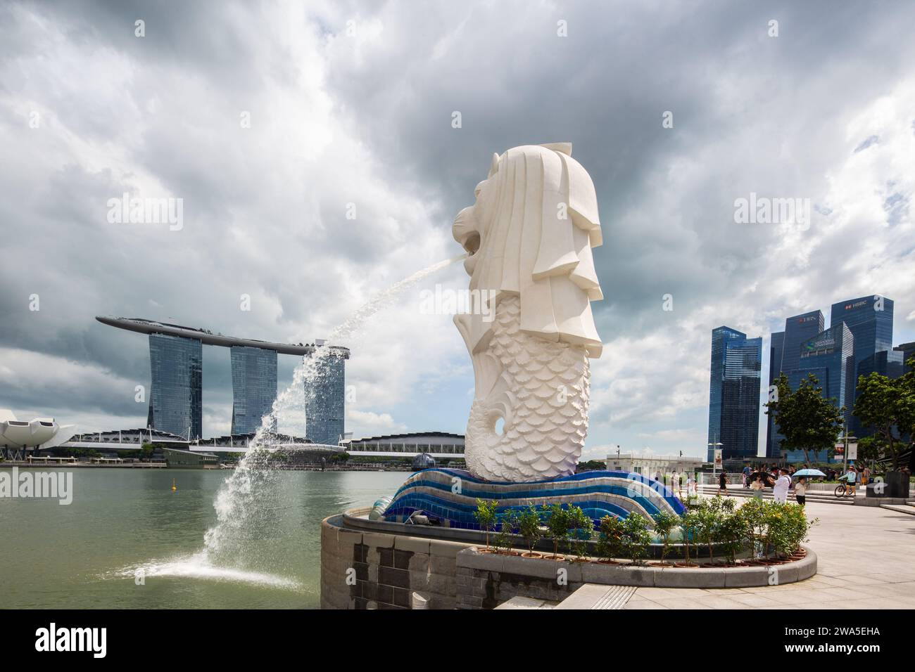 Under the dramatic cloudy sky, the left side back view of the iconic ...