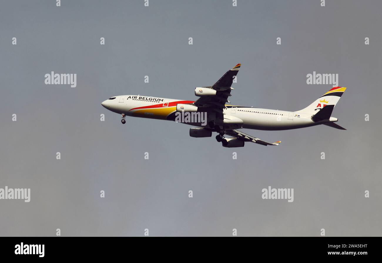 Air Belgium Passenger plane 00-ABA flying over Southwest London England ...