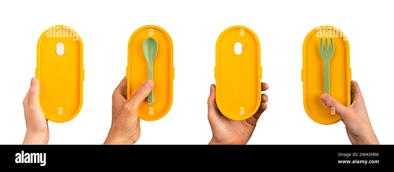 Hands holding lunch boxes and plastic spoon. Lunchbox, eco food ...