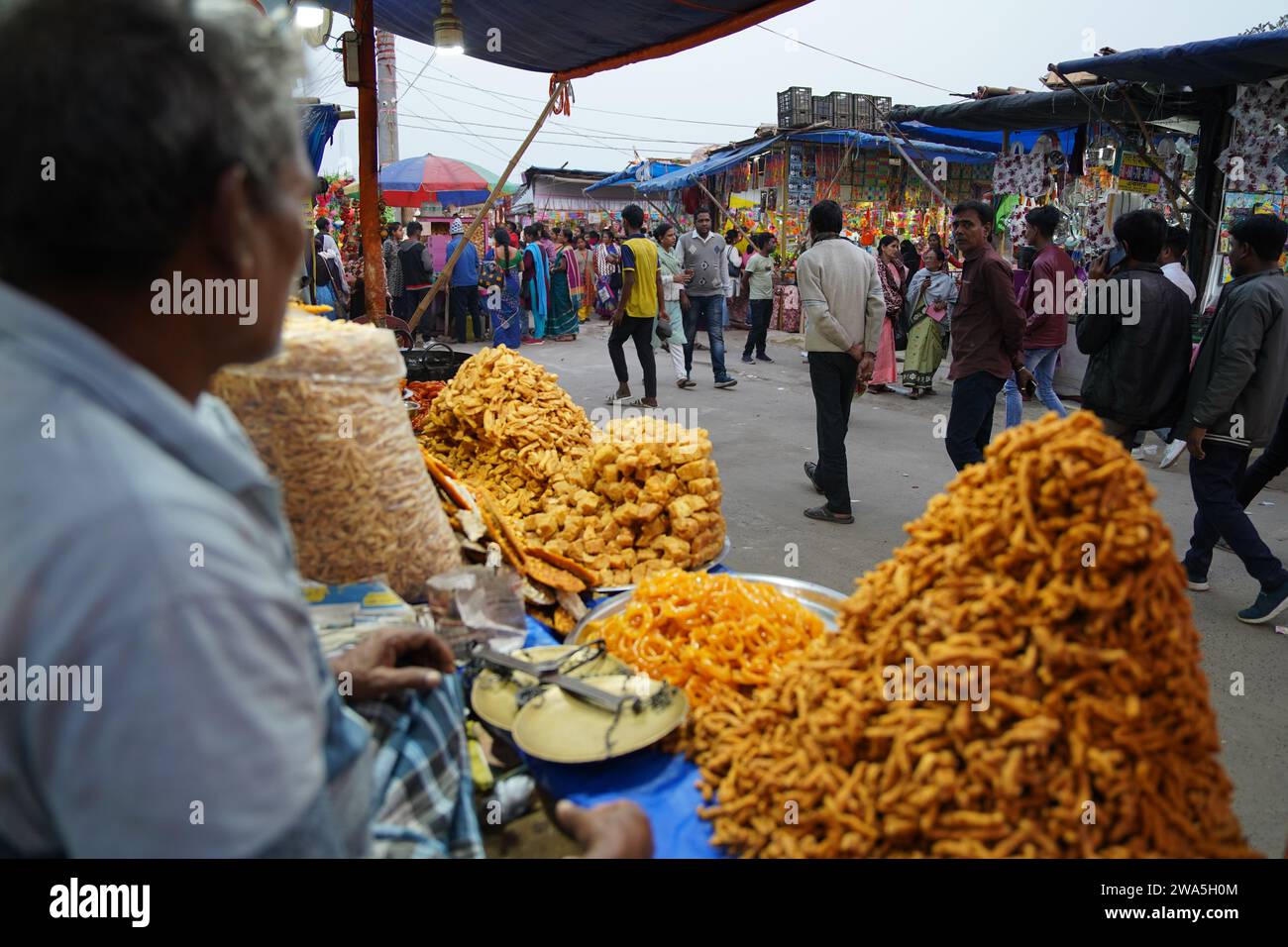 Uluberia, West Bengal, India. 30th Dec, 2023. Along the glimmering ...