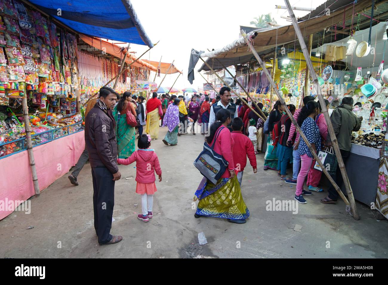 Uluberia, West Bengal, India. 30th Dec, 2023. Along the glimmering ...