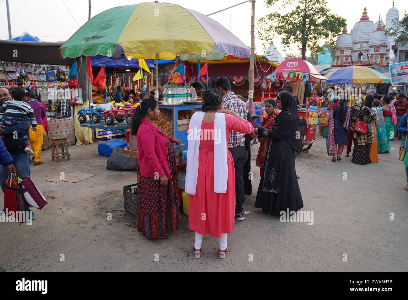 Uluberia, West Bengal, India. 30th Dec, 2023. Along the glimmering ...
