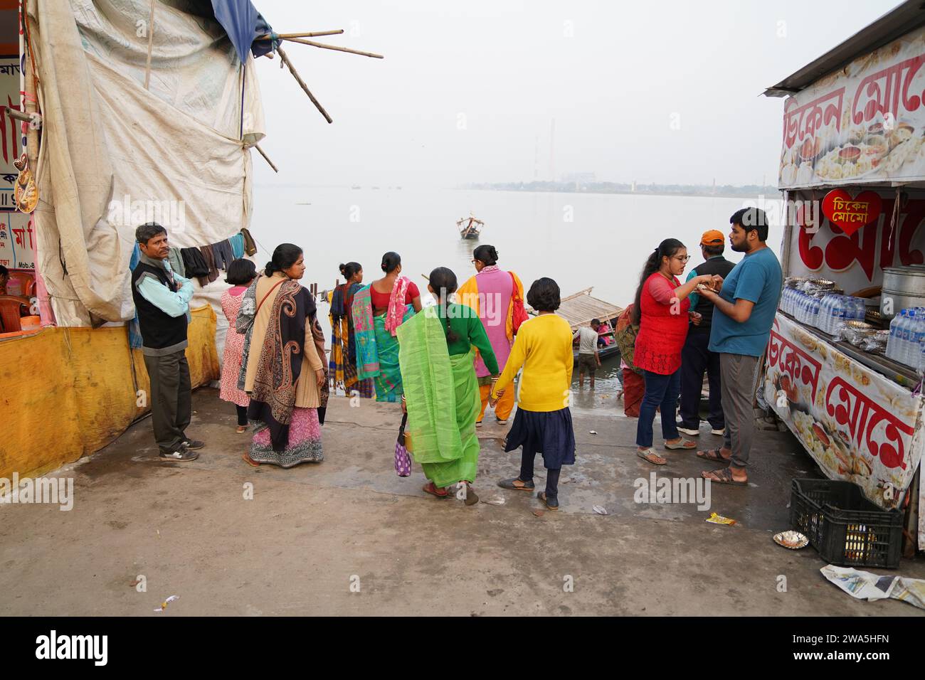 Uluberia, West Bengal, India. 30th Dec, 2023. Along the glimmering ...