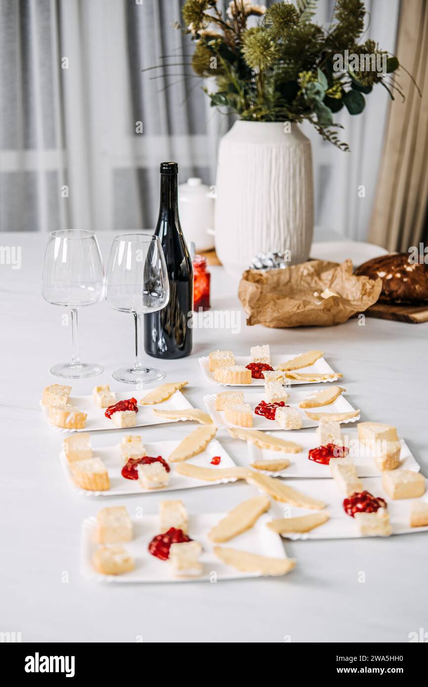 Wine Tasting Preparation with Cheese Pairings. Sommelier prepares for a ...