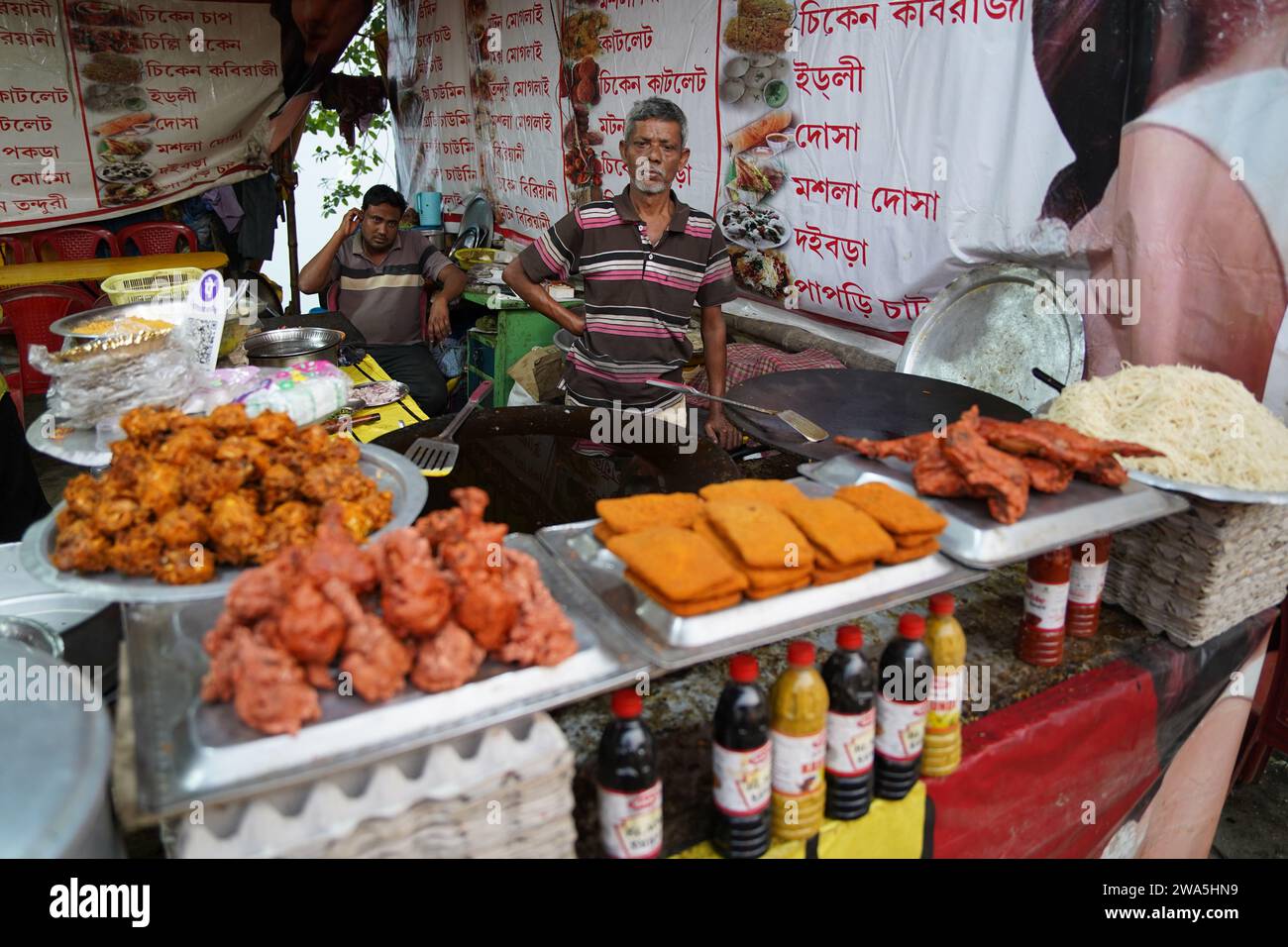 Uluberia, West Bengal, India. 30th Dec, 2023. Along the glimmering ...