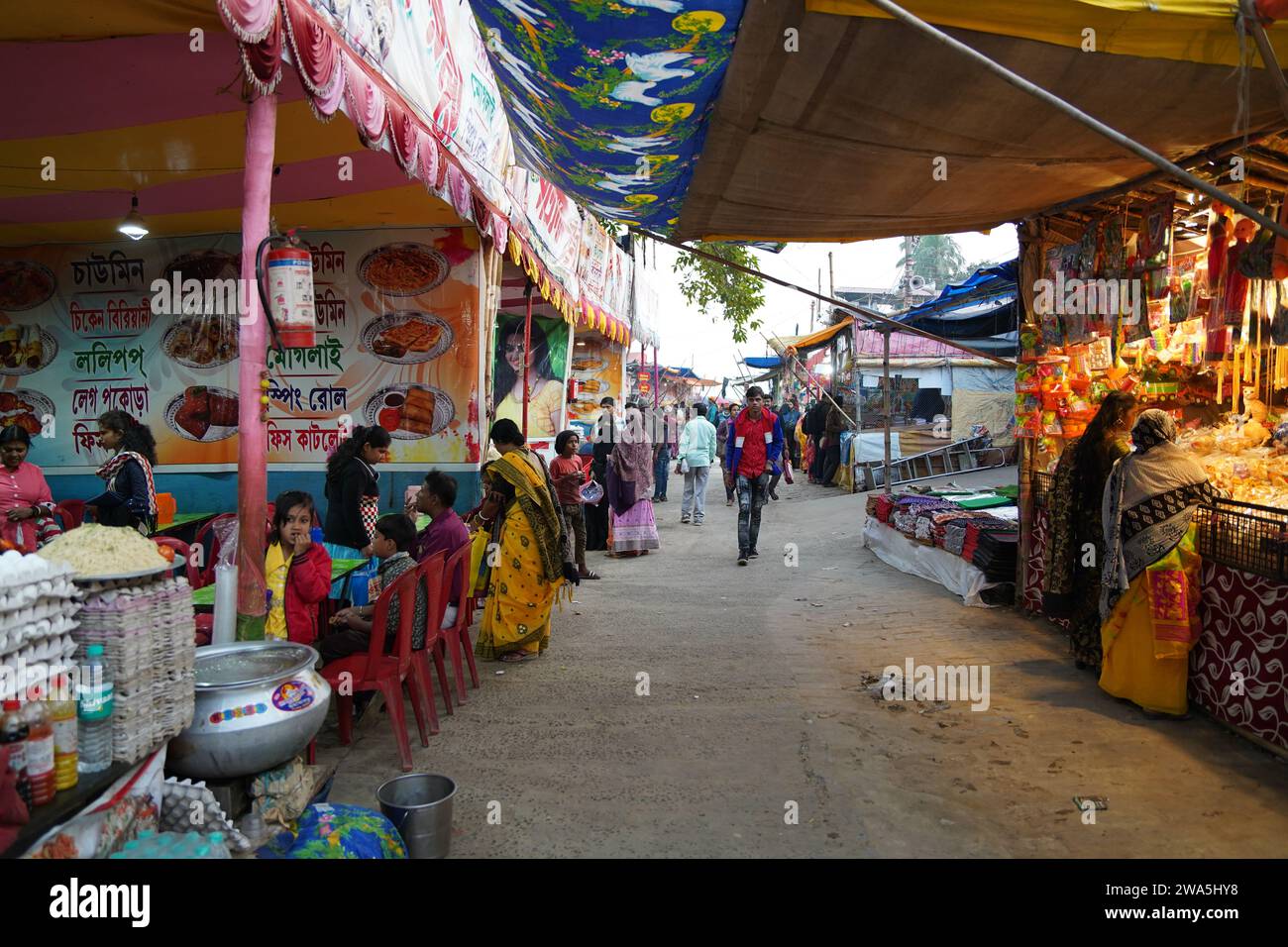 Uluberia, West Bengal, India. 30th Dec, 2023. Along the glimmering ...