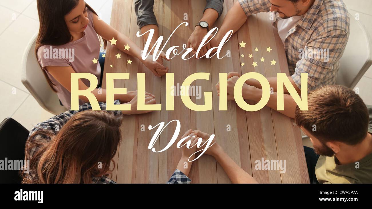 Group of people praying at table. World Religion Day Stock Photo - Alamy