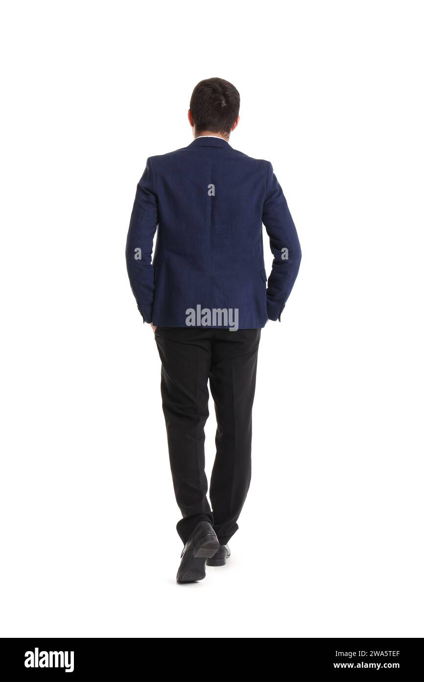 Young businessman walking away on white background, back view Stock ...
