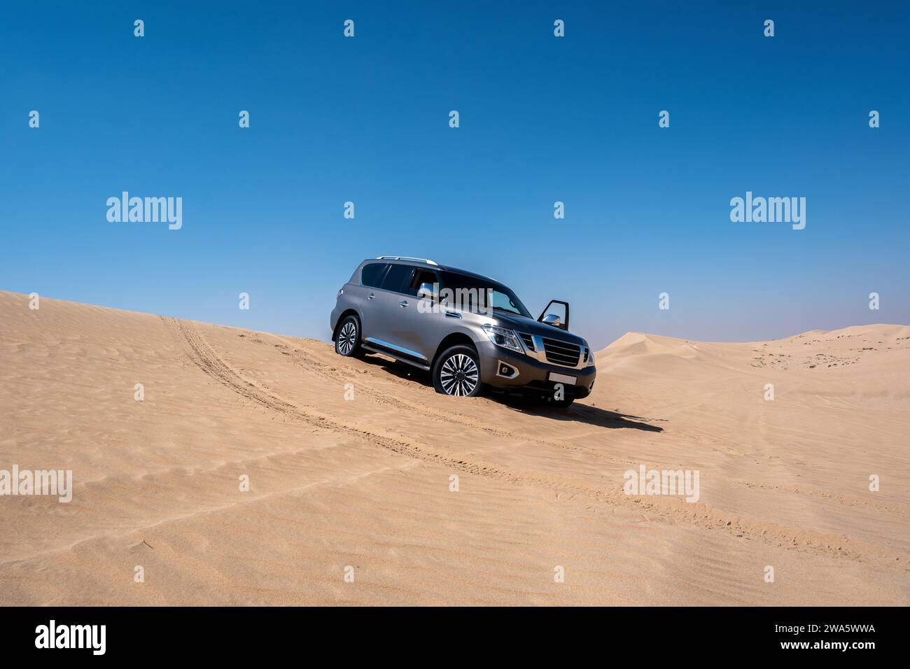 SUV four wheel drive vehicle car Al Qudra empty quarter seamless desert ...