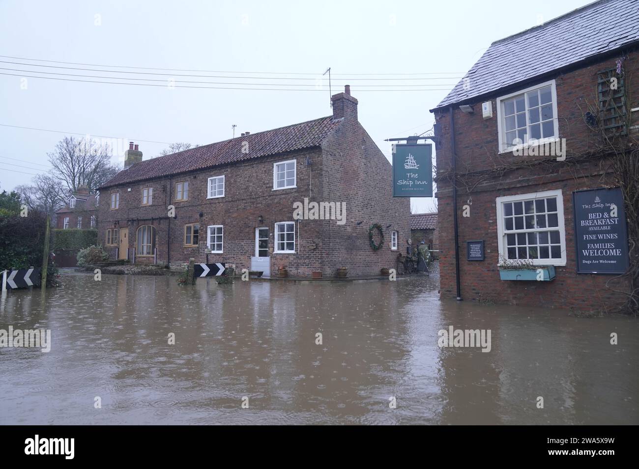 Flooding in Acaster Malbis near York. The Met Office has issued an ...