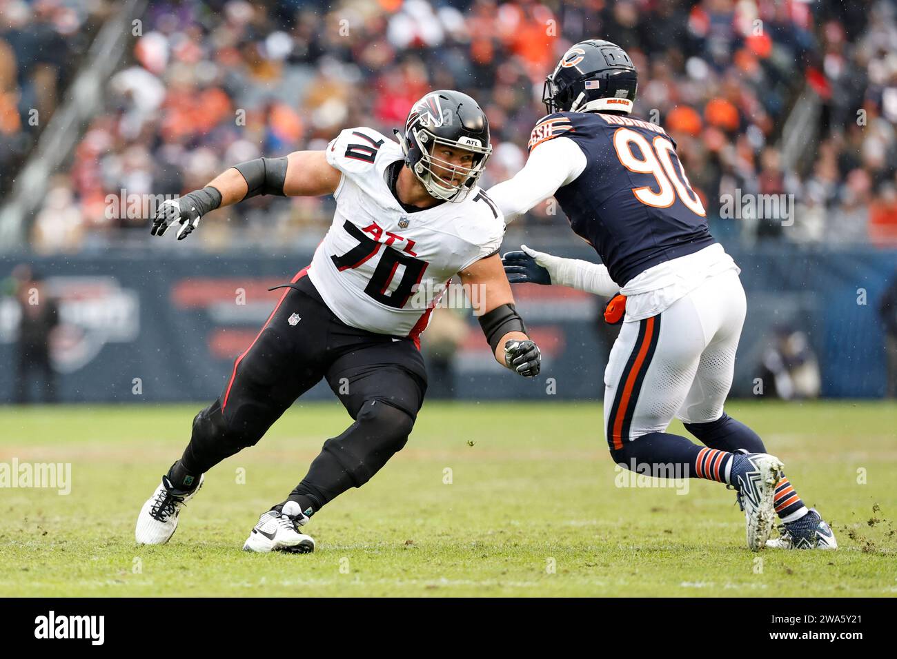 Atlanta Falcons offensive tackle Jake Matthews (70) runs on the field ...