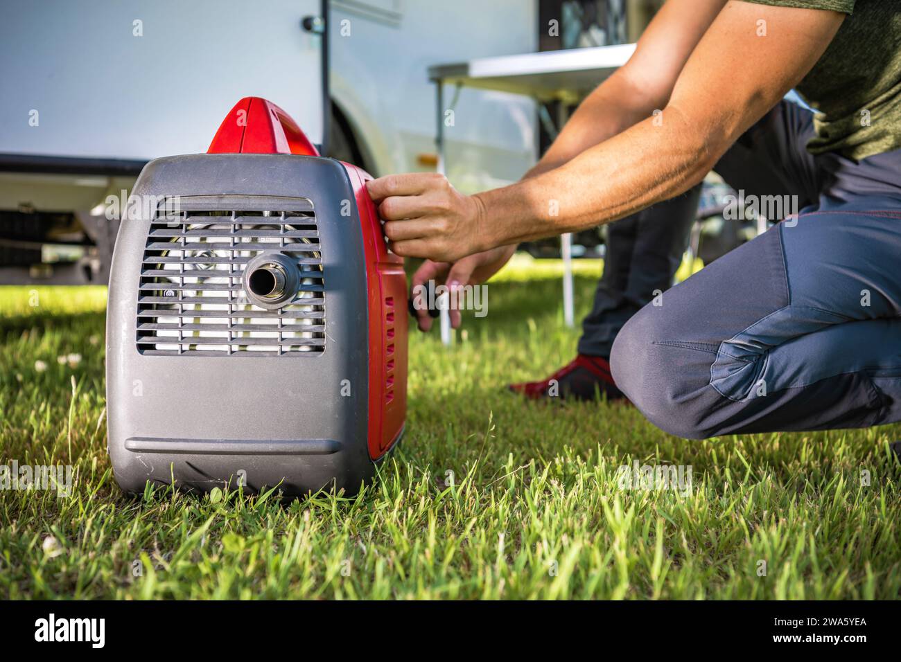 Portable Electricity Generator on a Camping. RV Camper Van in a ...