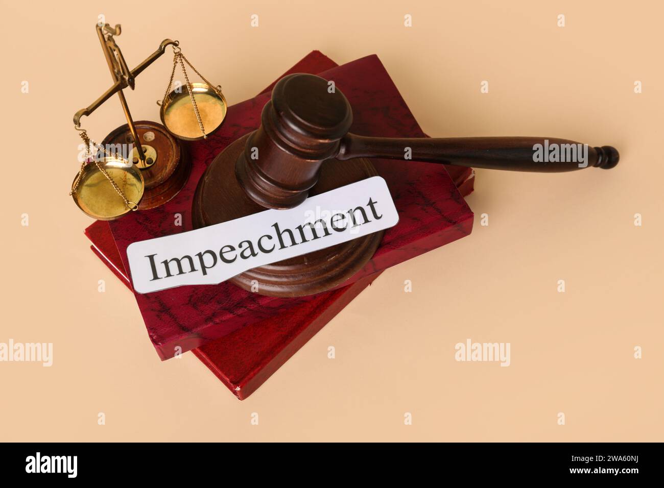 Word IMPEACHMENT, judge gavel, scales of justice and law books on beige ...