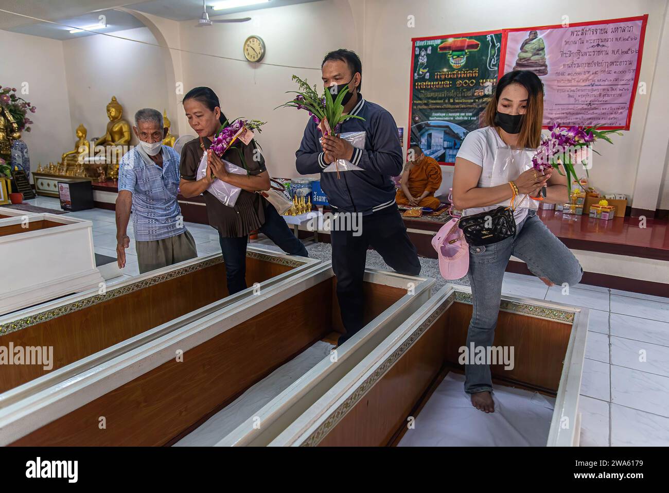 Buddhist devotees seen entering inside coffins to perform a ...