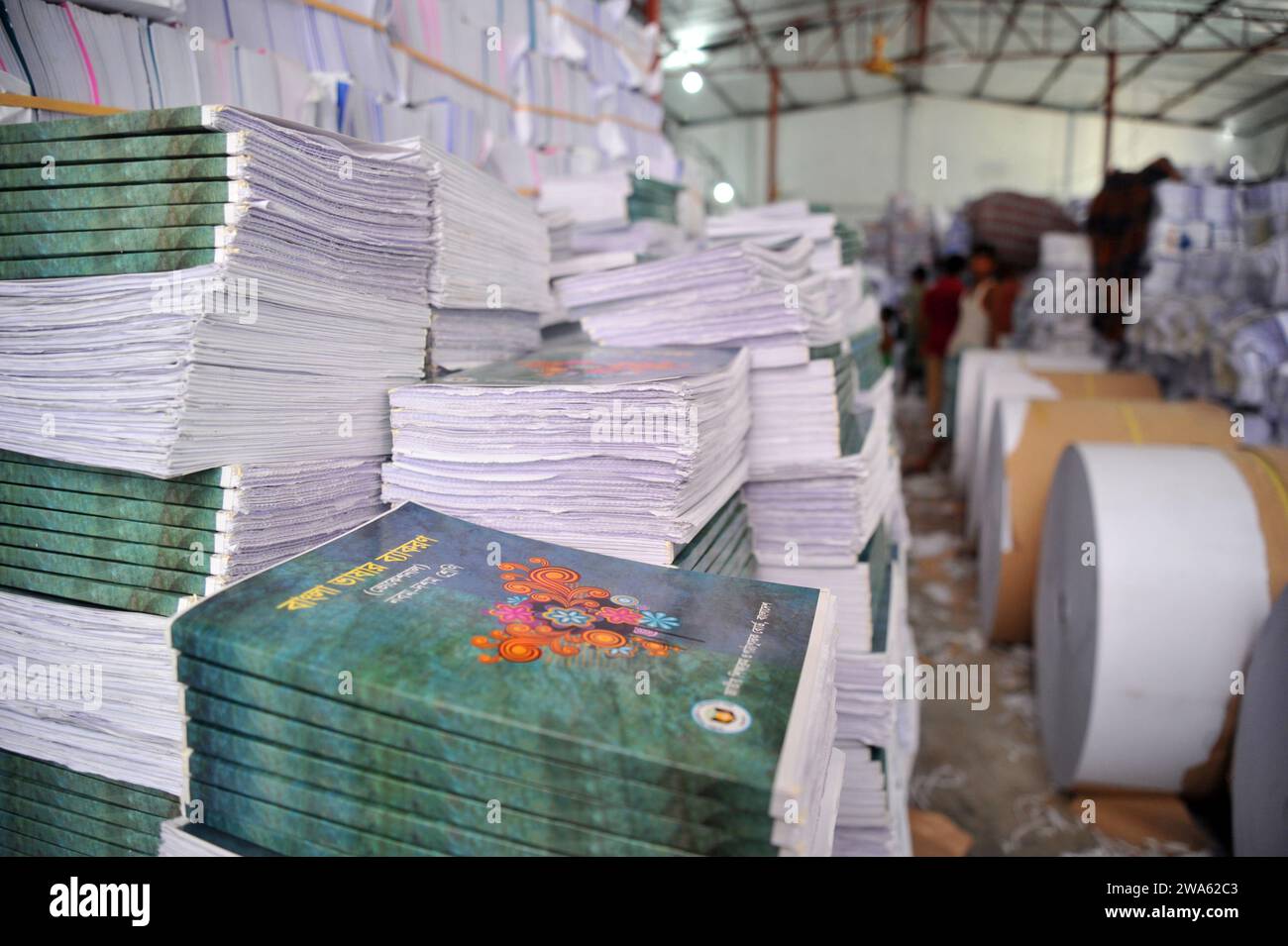 Bangladeshi worker works in a book binding factory in Dhaka City in ...