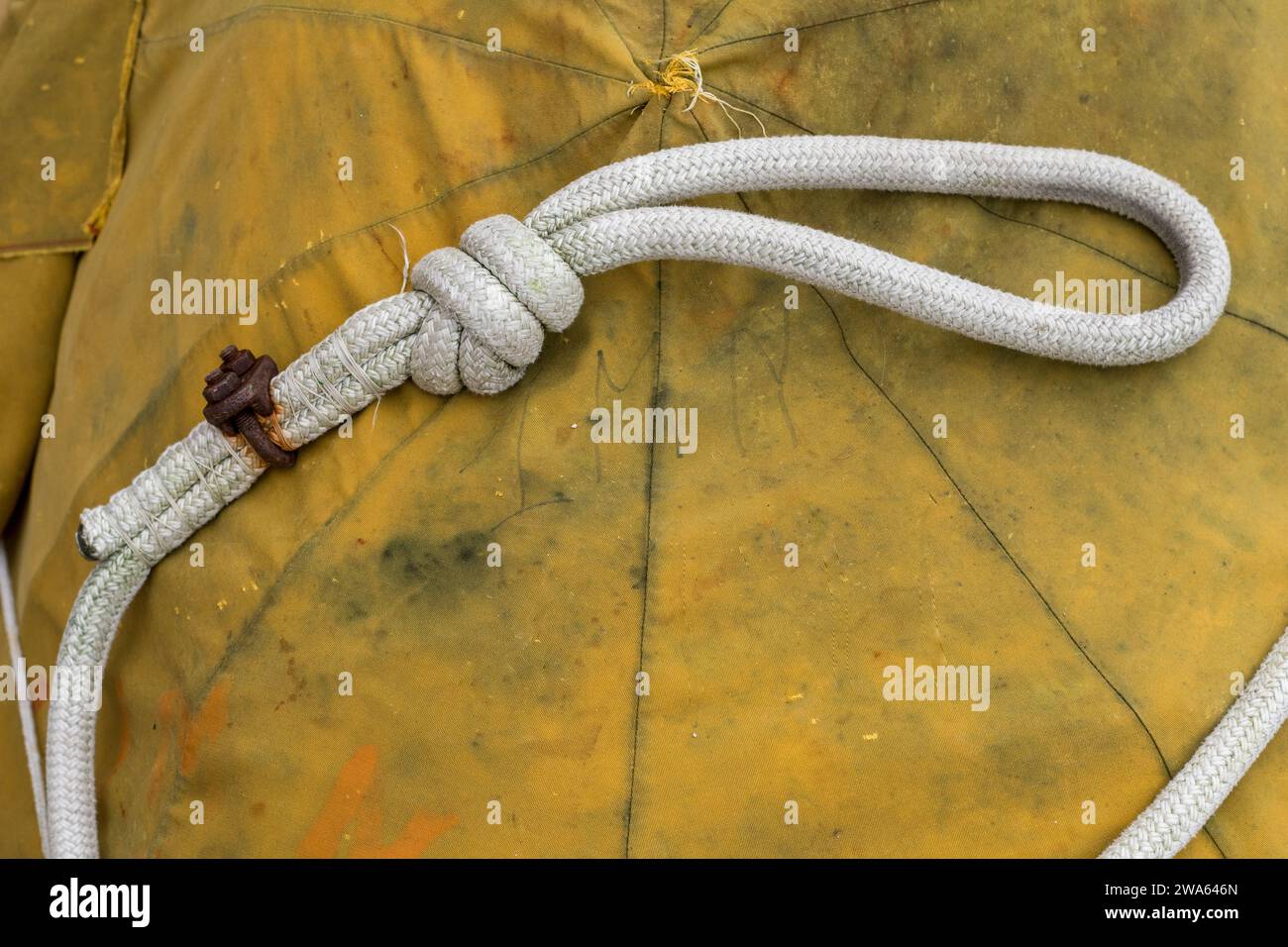 Close-up of a rope with a knot for quick attachment on the port of ...
