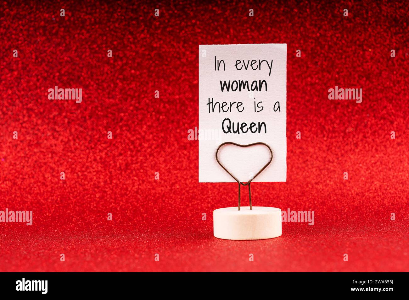 Paper note with text in every woman there is a queen Stock Photo - Alamy