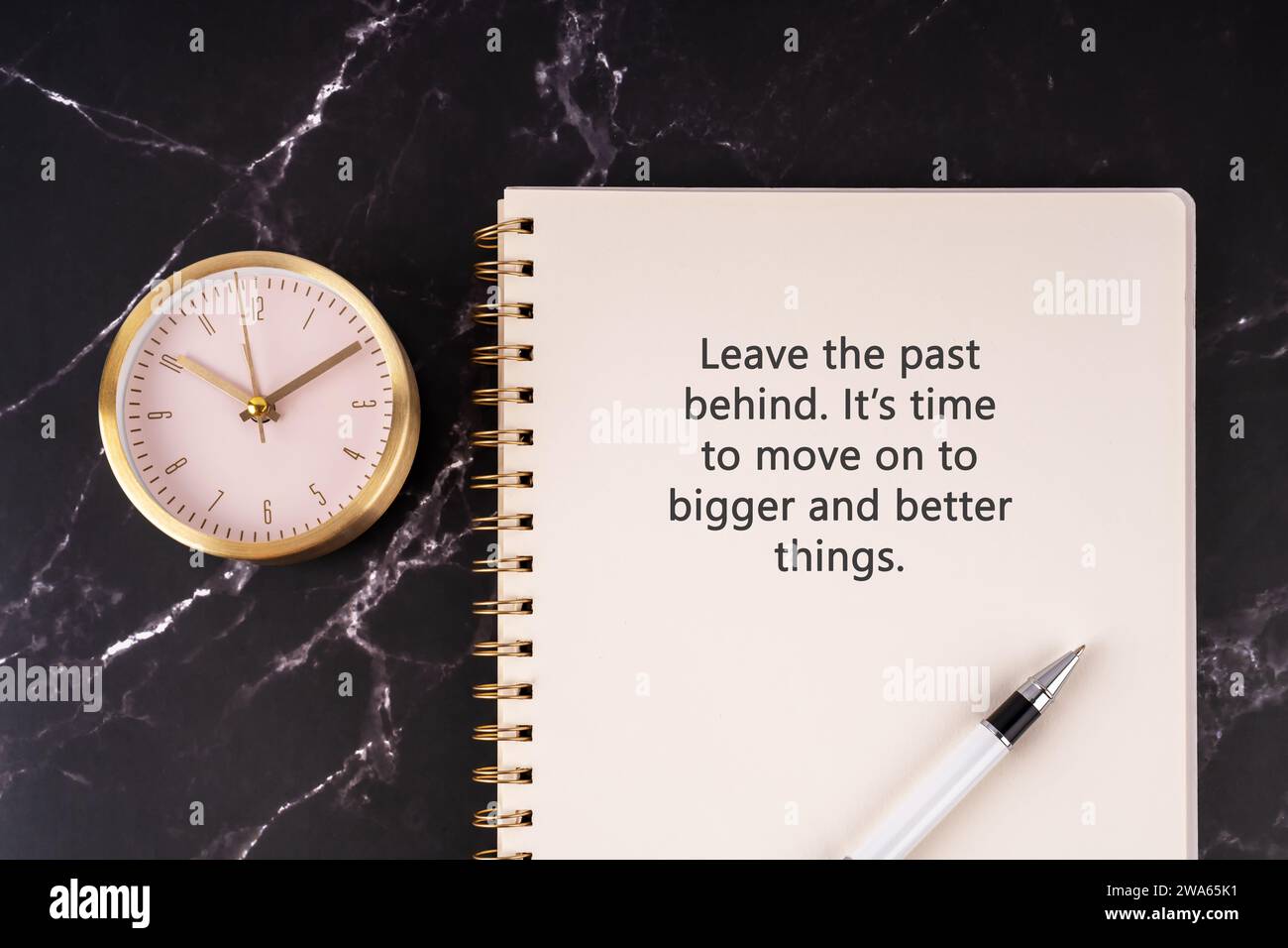 Inspirational quotes on notepad - Leave the past behind. It's time to ...