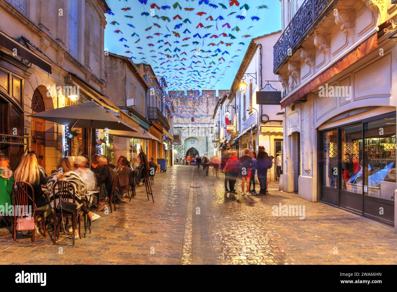 Pedestrian street within the walls of Aigues-Mortes, a medieval ...
