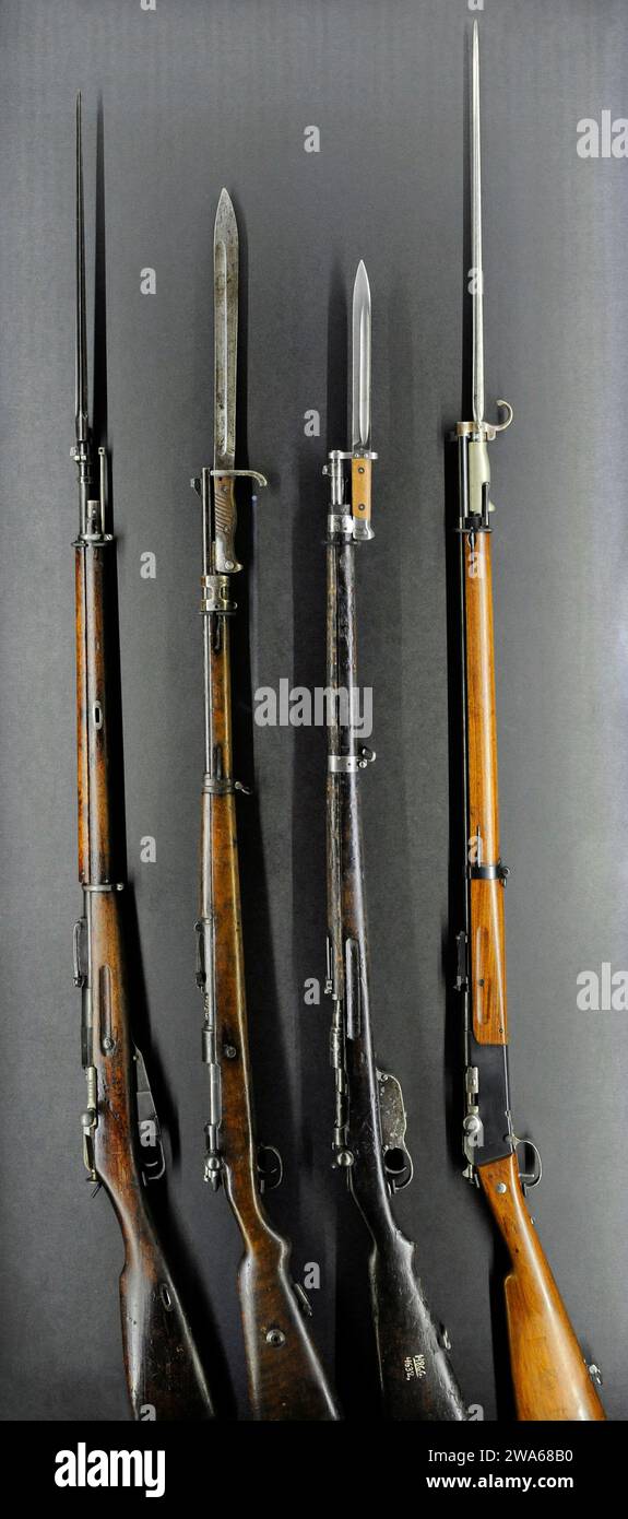 World War I (1914-1918). From left to right: M-91/10 three-line rifle with bayonet, infantry ...