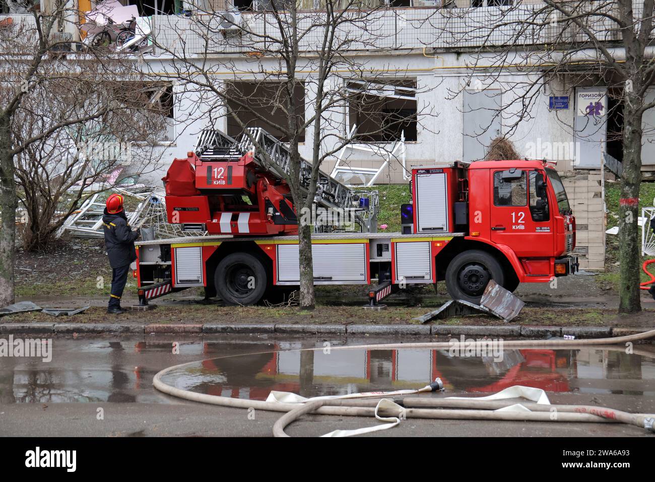 Non Exclusive: KYIV, UKRAINE - JANUARY 2, 2024 - A firefighter operates ...