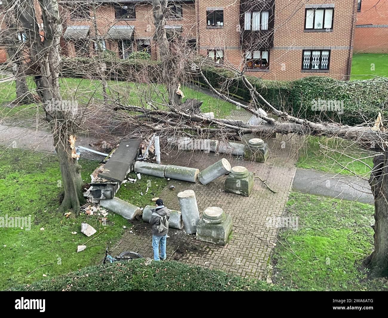 A tree blown over by the wind and crashed into the portico, knocking it ...