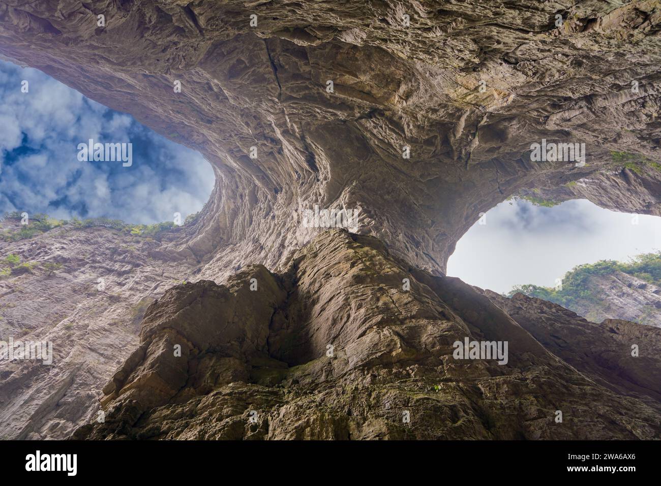 The sky is a natural opening in the roof of the rock pit. The Three ...