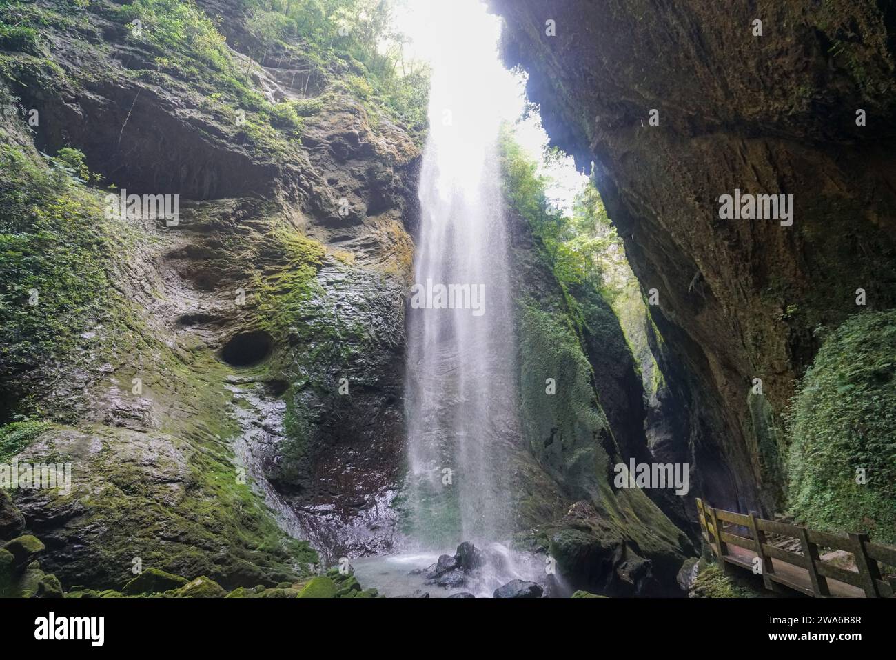 Waterfalls in the canyon fall from the sky. Like a silver-white chain ...