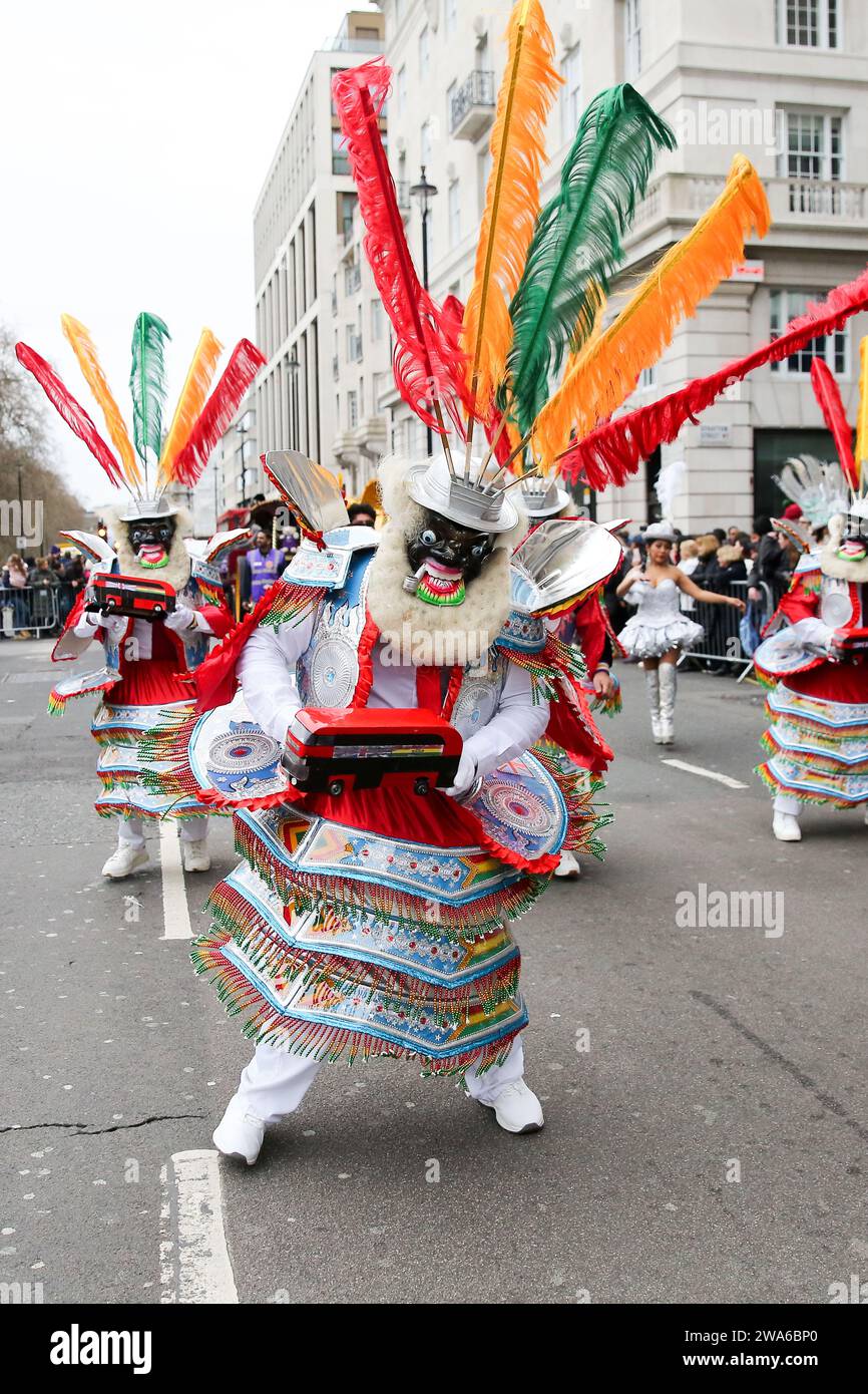 London, UK. 01st Jan, 2024. A performer seen wearing a coloured outfit takes part in the annual ...