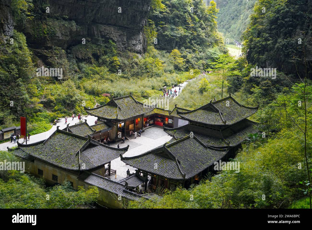 The lush valley has a secluded trail and Tang Dynasty style buildings ...