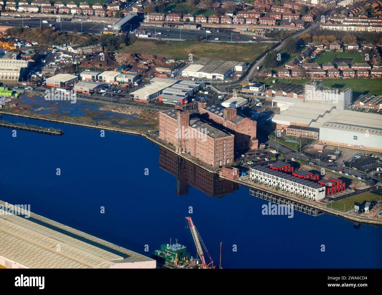 New buildings reflected in Birkenhead dock shot from the air, River ...