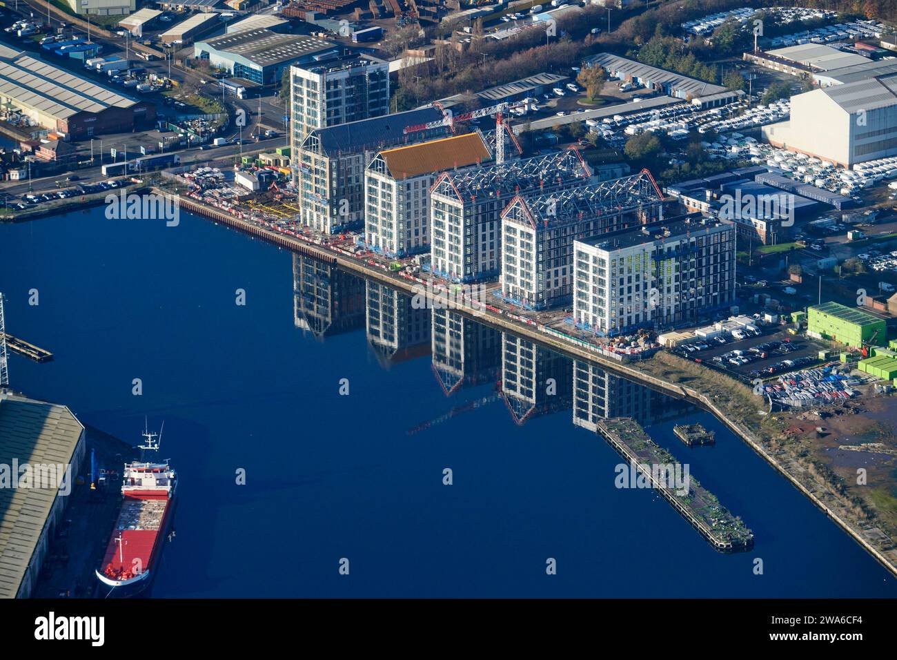 New buildings reflected in Birkenhead dock shot from the air, River ...