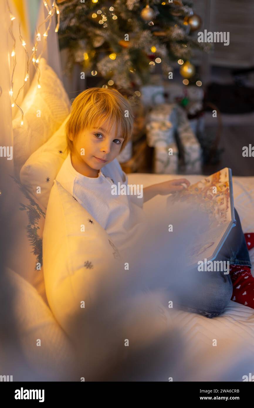 Sweet amazing cute children, boy brothers, hugging at home in front of ...